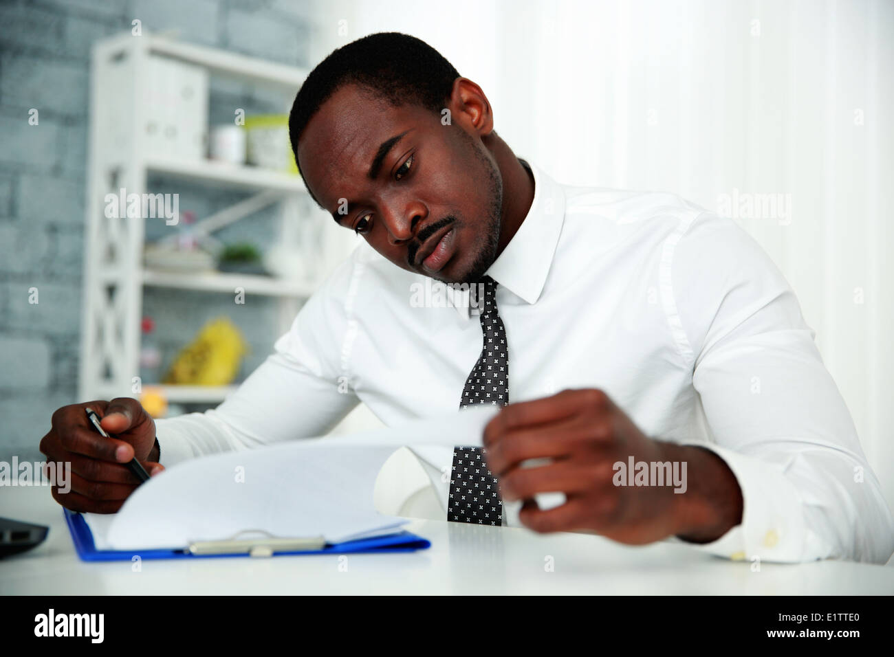 Man african descent holding smart hi-res stock photography and images ...