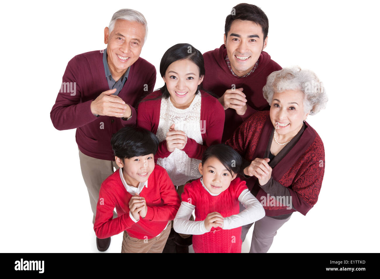 Cheerful family celebrating for Chinese New Year Stock Photo - Alamy