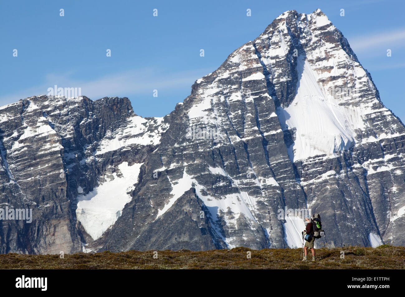 Backpacker in front of Mt Sir Donald, Selkirk Mountains, Glacier ...