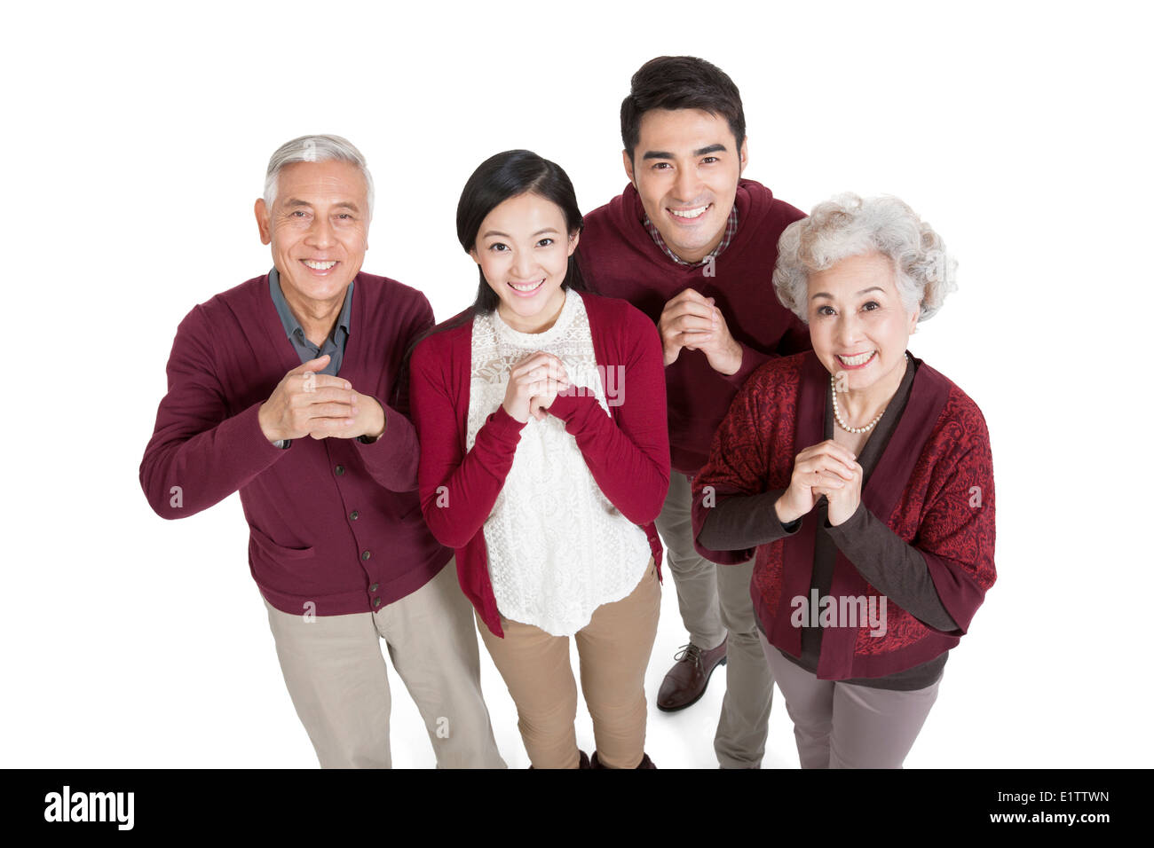 Cheerful family celebrating for Chinese New Year Stock Photo - Alamy