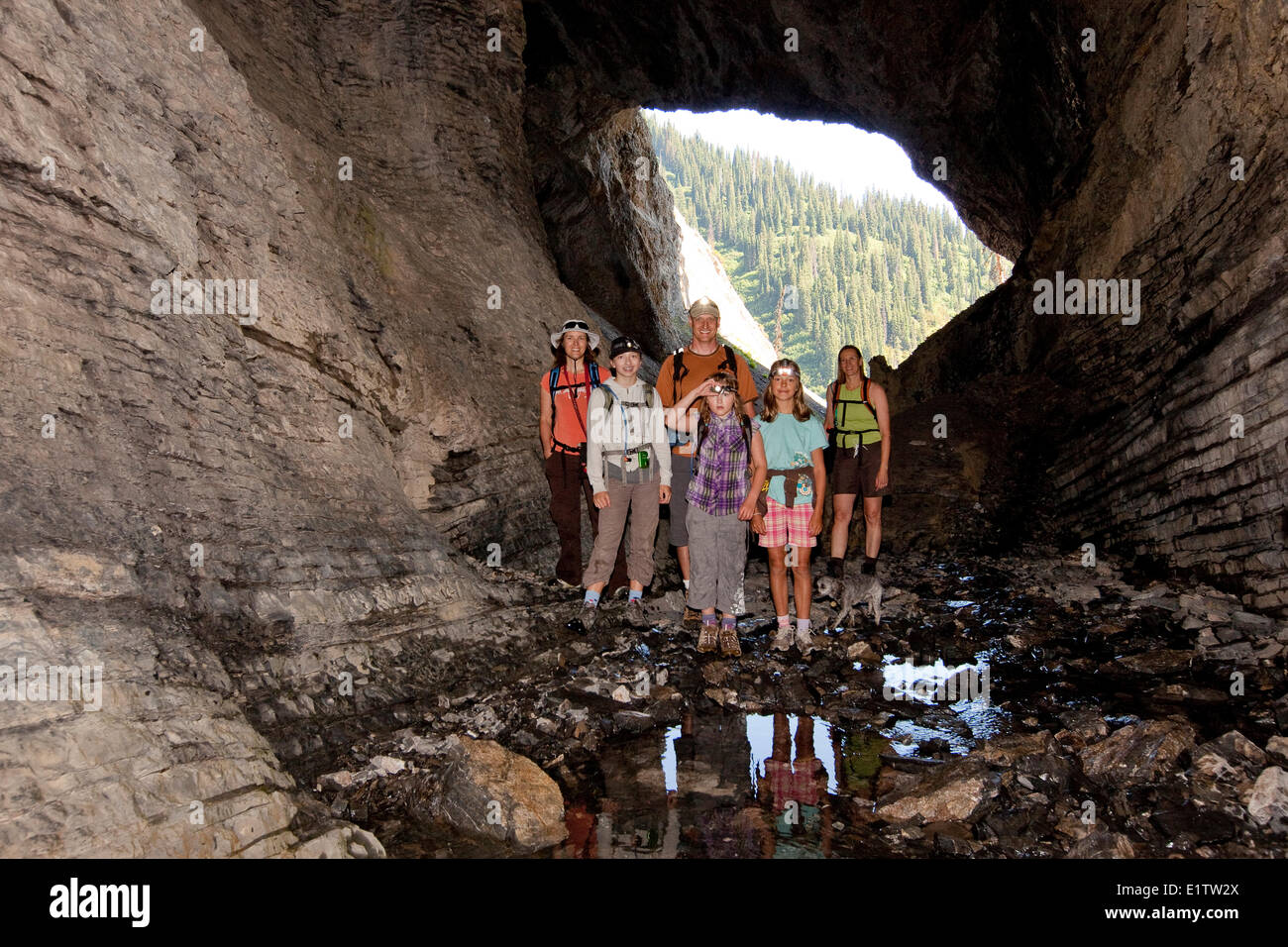 Two young families explore cave on Mountain Lakes Trail near Fernie, BC ...