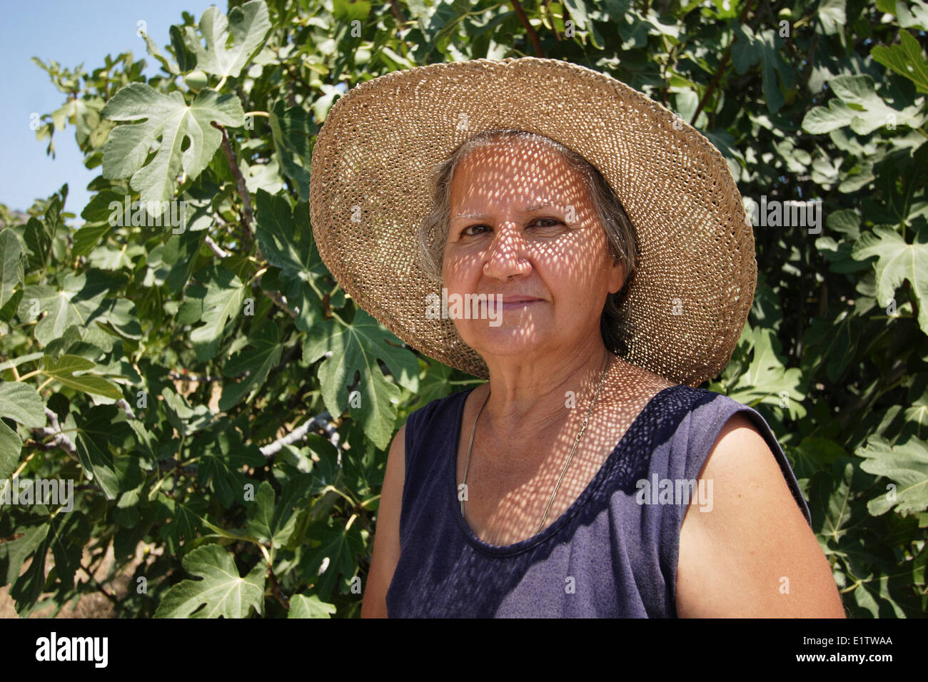 Greek woman in sun hat, Rhodes Island - Pefki - Lardos Bay - Greece ...
