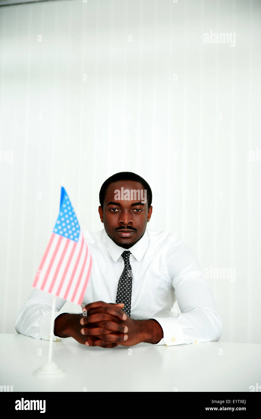 Flag sitting serious vertical hi-res stock photography and images - Alamy