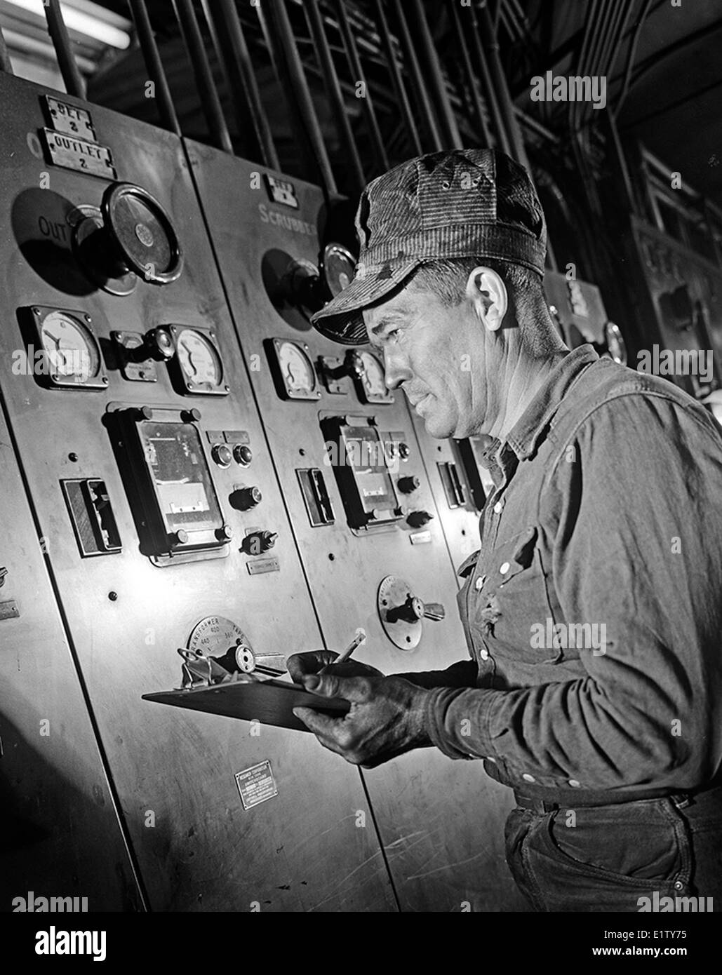 [Worker Inspecting Control Panel Gauges, Aransas Plant, United Carbon ...
