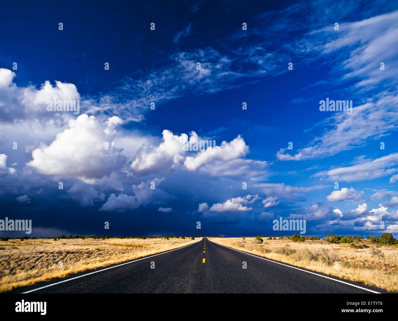 Thunderstorm storm clouds above desert road highway in new mexico hi ...