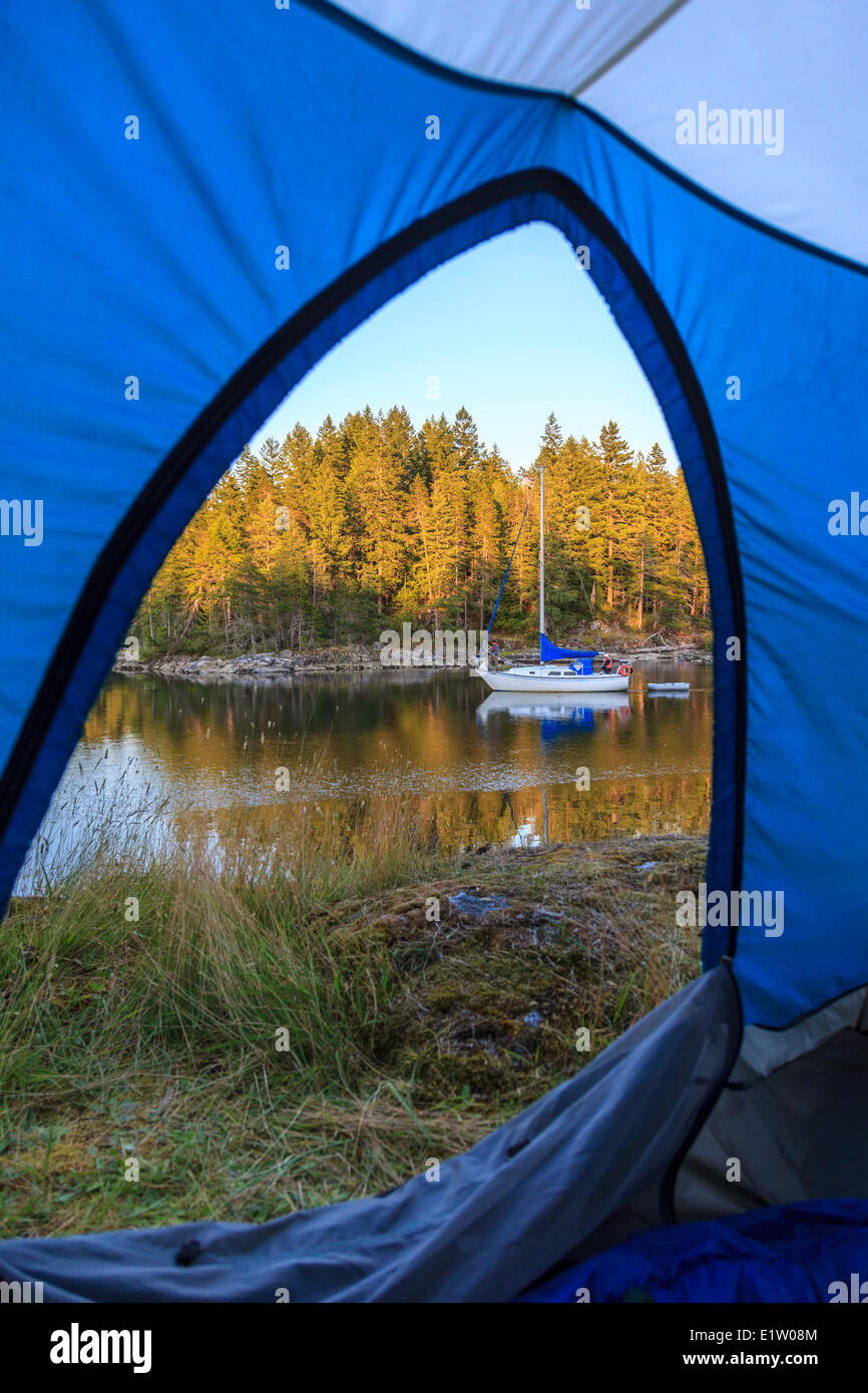 A yacht heads for anchorage in the calm waters of Octupus Island ...