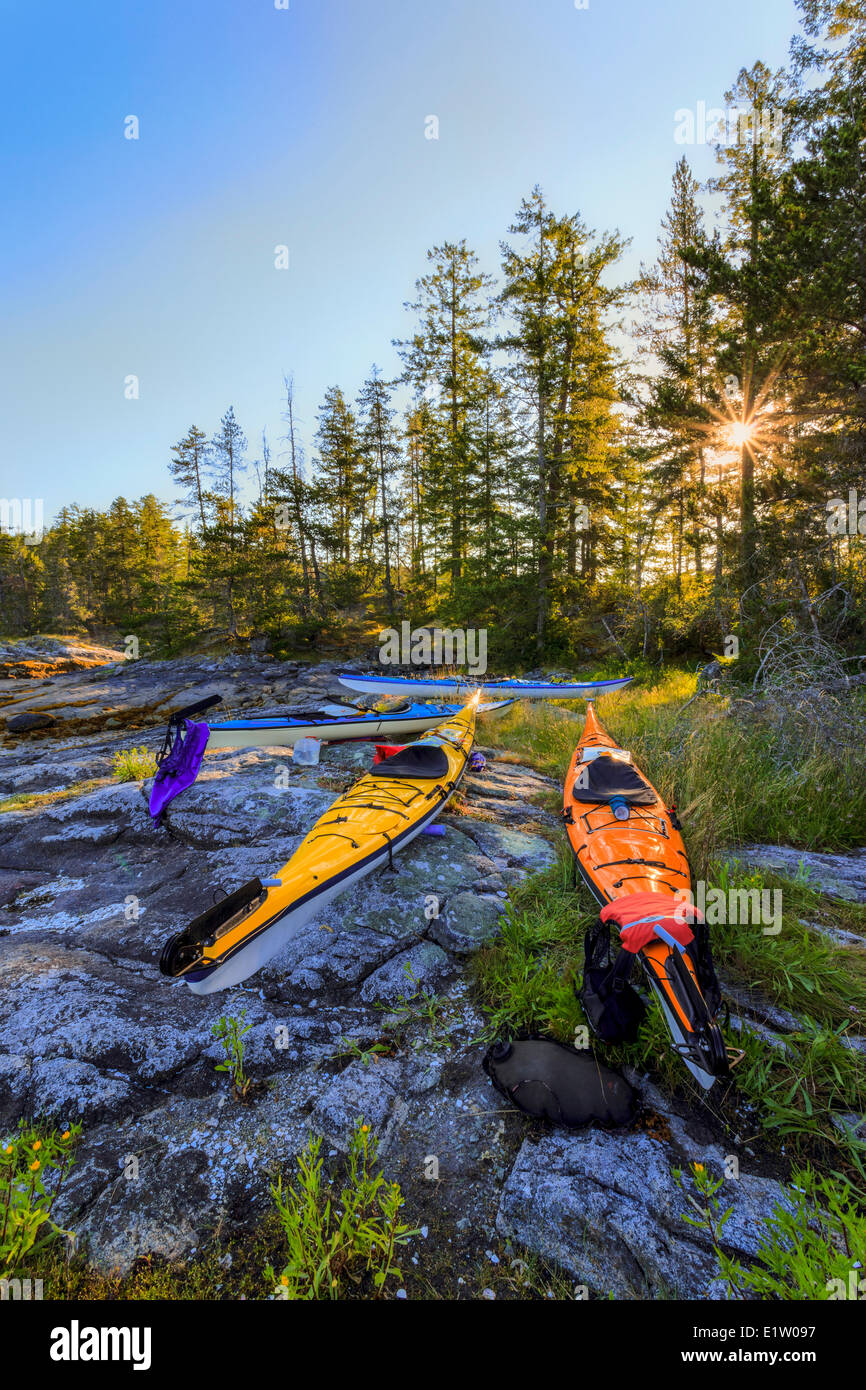 Kayaks rest above the high tide mark on Octupus Island Provincial ...
