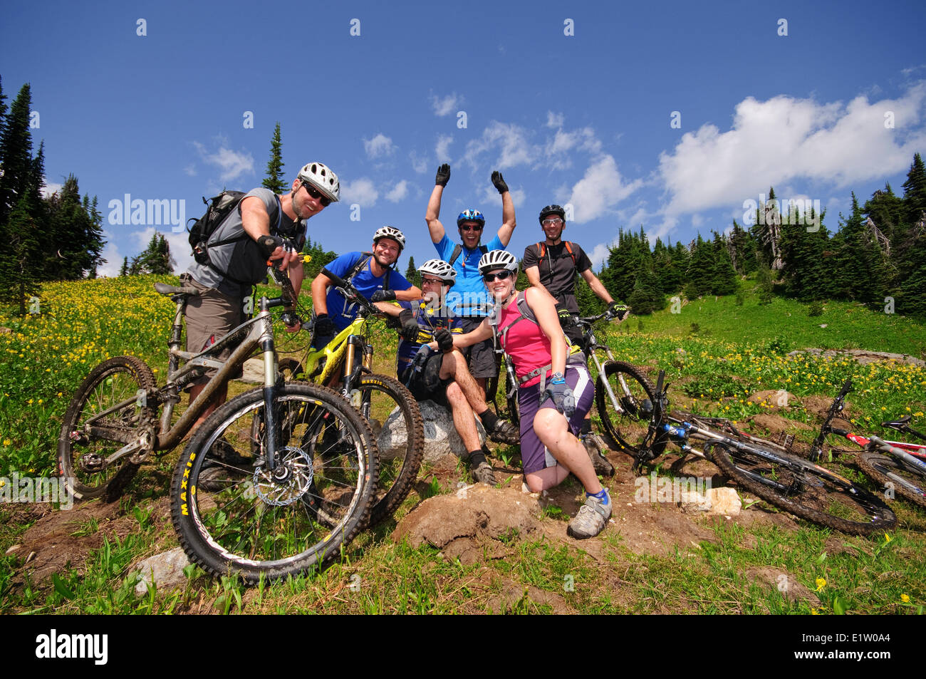 Group bikers riding mountain bikes hi-res stock photography and images ...