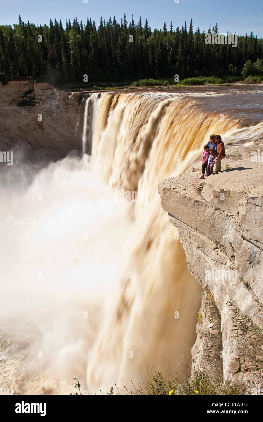 Young family enjoys view at Alexandra Falls, Northwest Territories ...