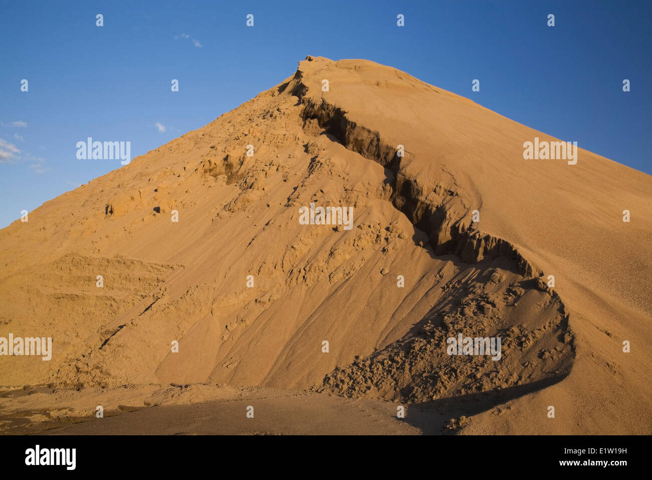 Mound of sand in a commercial sandpit hi-res stock photography and ...