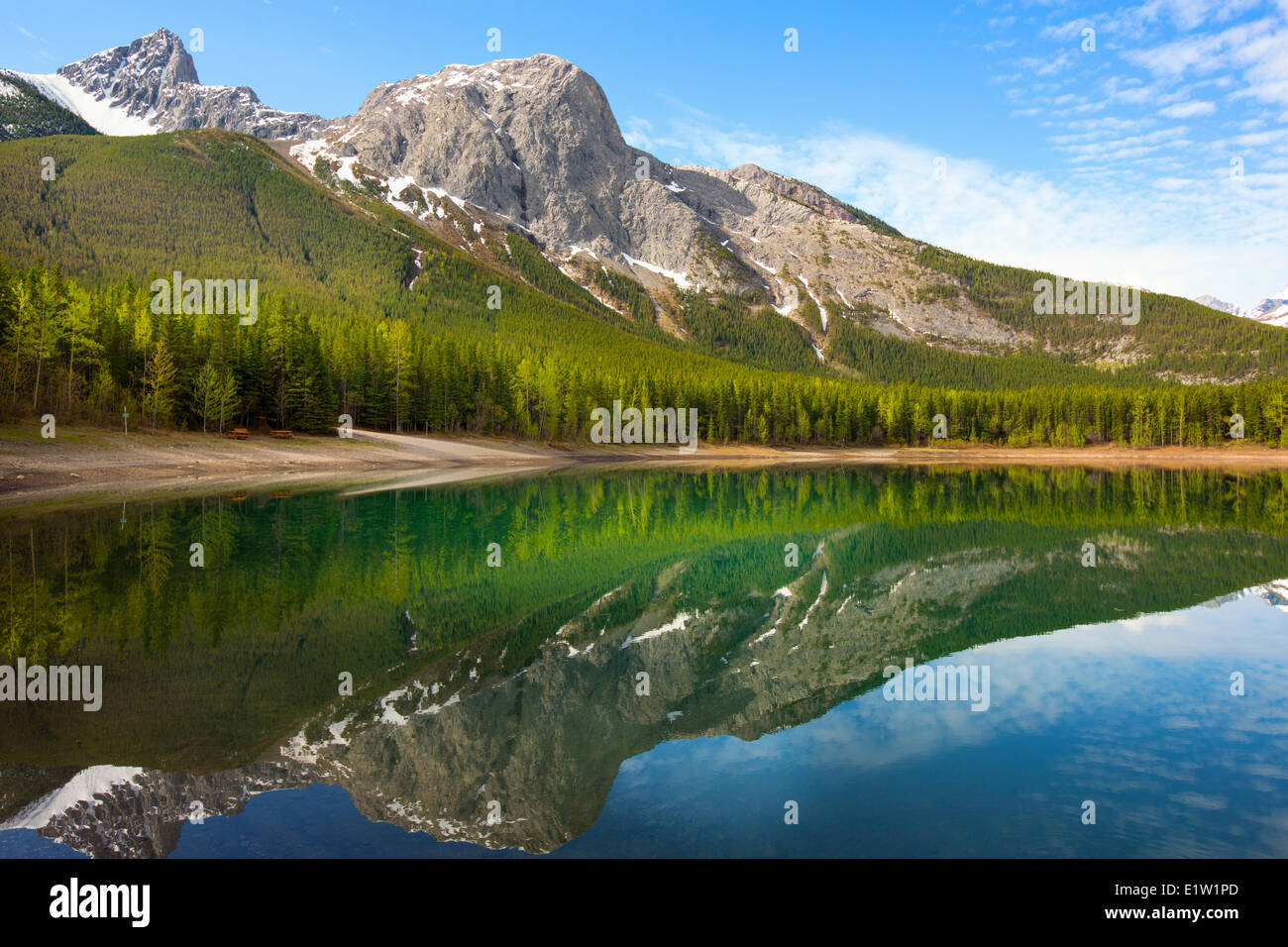 Mountains reflected in Wedge Pond, Kananaskis Provincial Park, Alberta ...