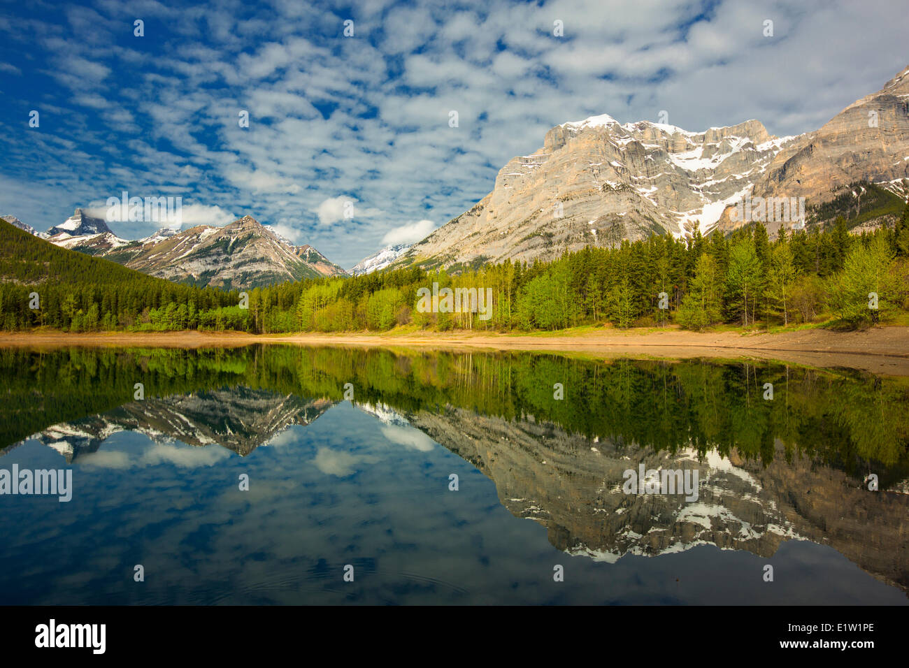 Mountains reflected in Wedge Pond, Kananaskis Provincial Park, Alberta ...