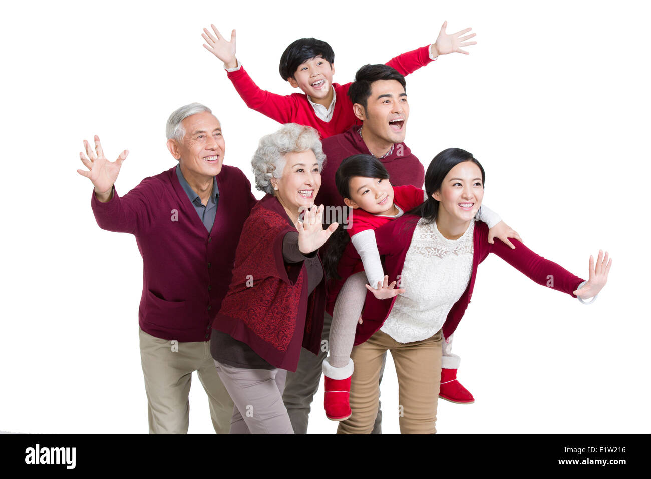 Portrait of big family waving Stock Photo - Alamy