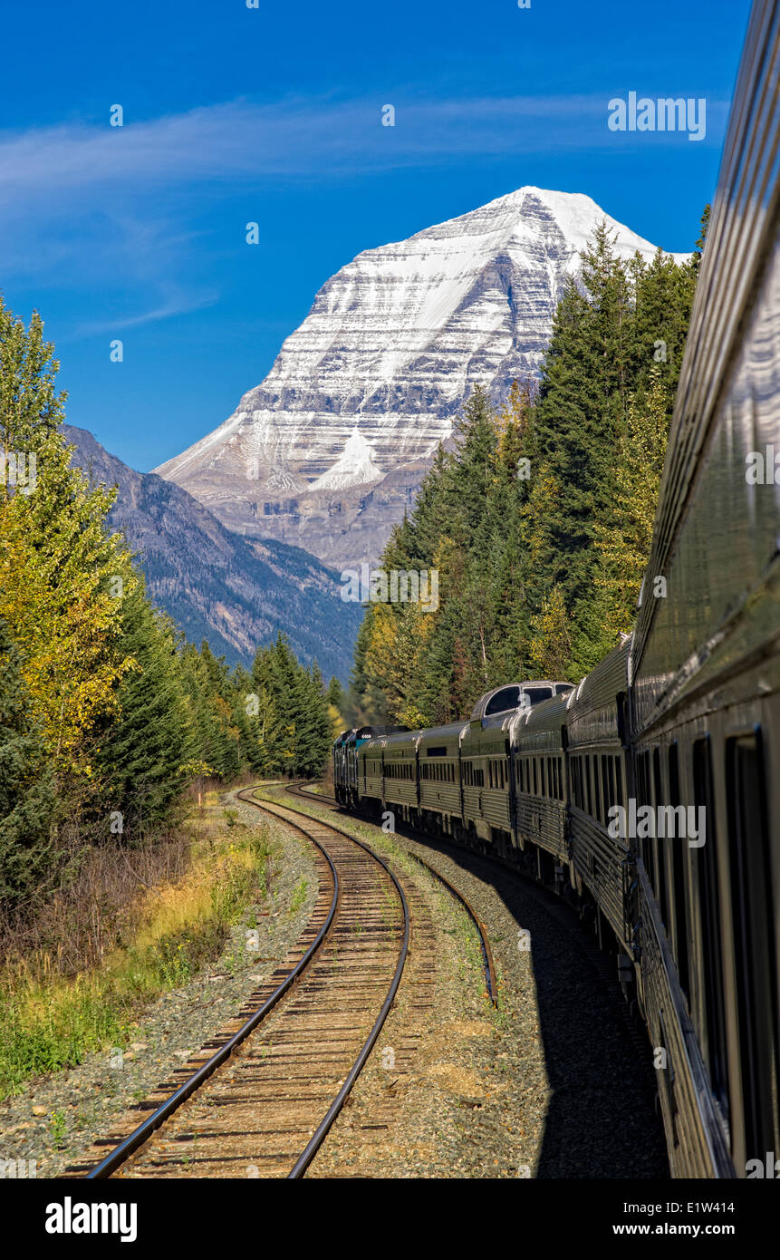 Passenger train with Mount Robson, the highest peak in the Canadian ...