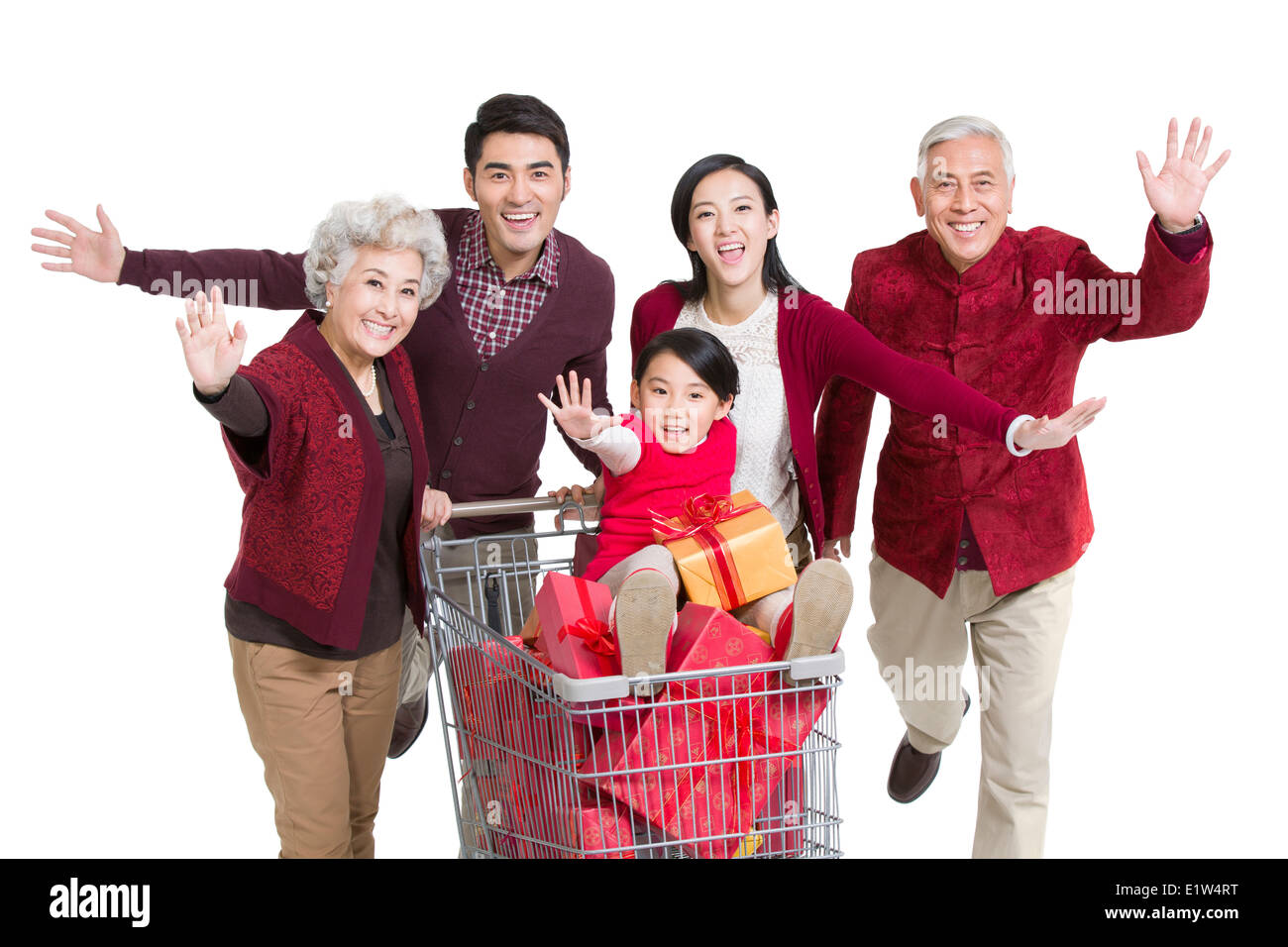 Happy family shopping Stock Photo - Alamy