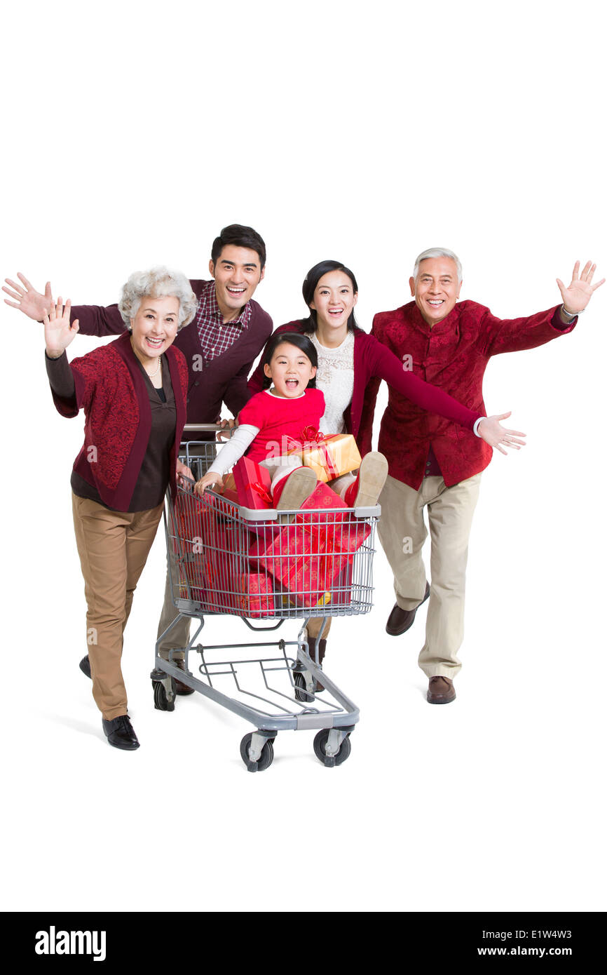 Happy family shopping Stock Photo - Alamy
