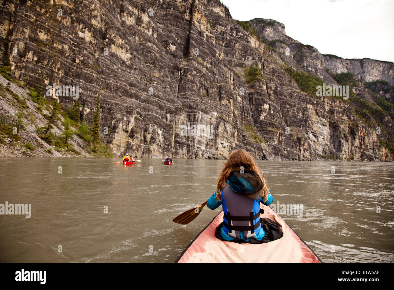 Three canoes in First Canyon on Nahanni River, Nahanni National Park ...