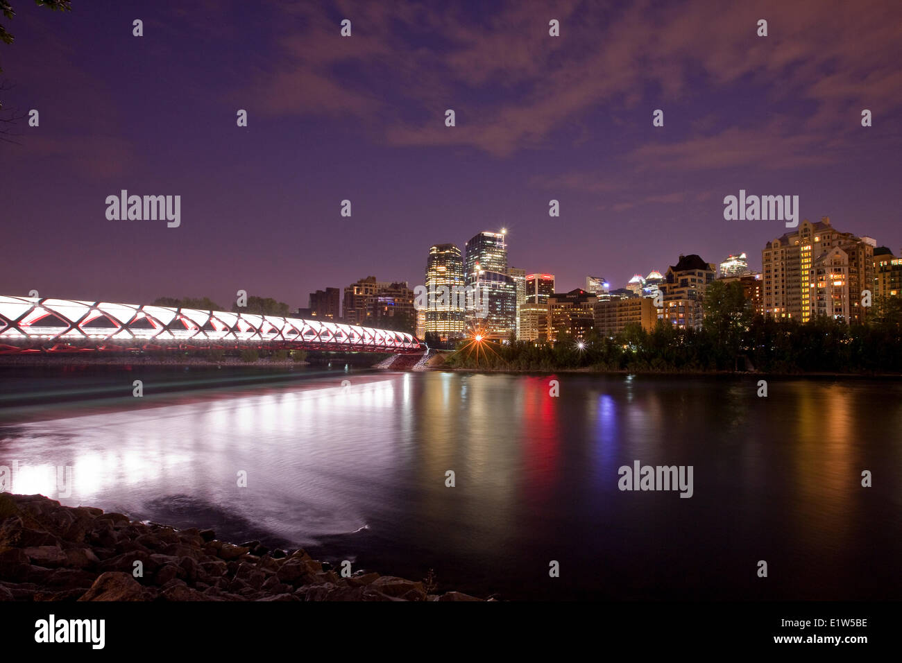 Calgary Peace Bridge downtown highrise buildings at night (Peace Bridge ...