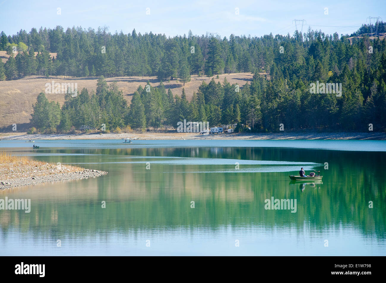 Fisherman enjoys a day on Lundbom Lake near Merritt in the Nicola ...