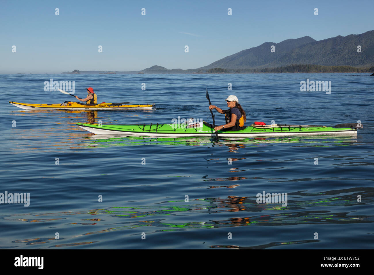 Two female kayakers paddle off Flores Island Provincial Park in ...