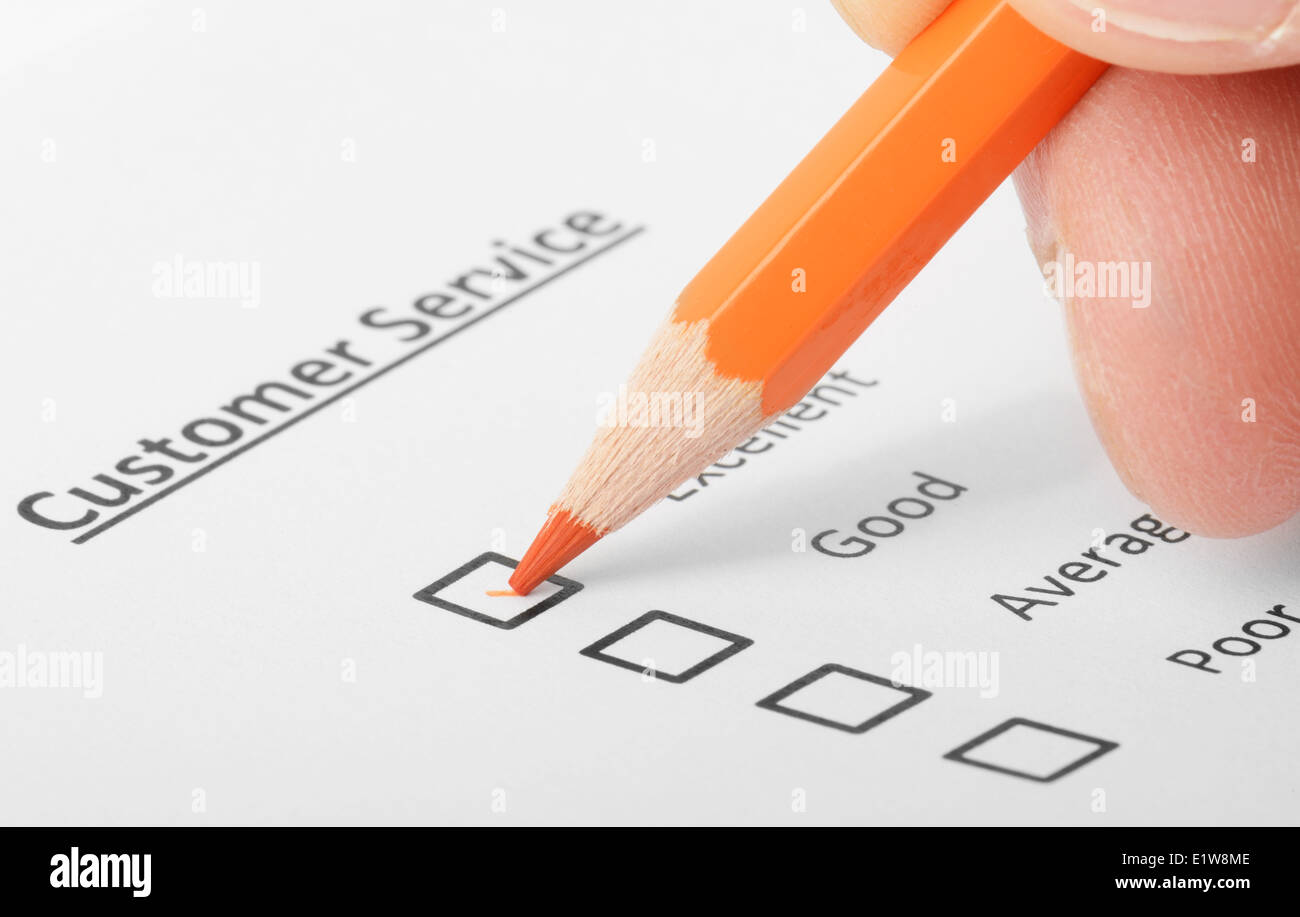 Concept image of someone completing a form showing the concept of ...