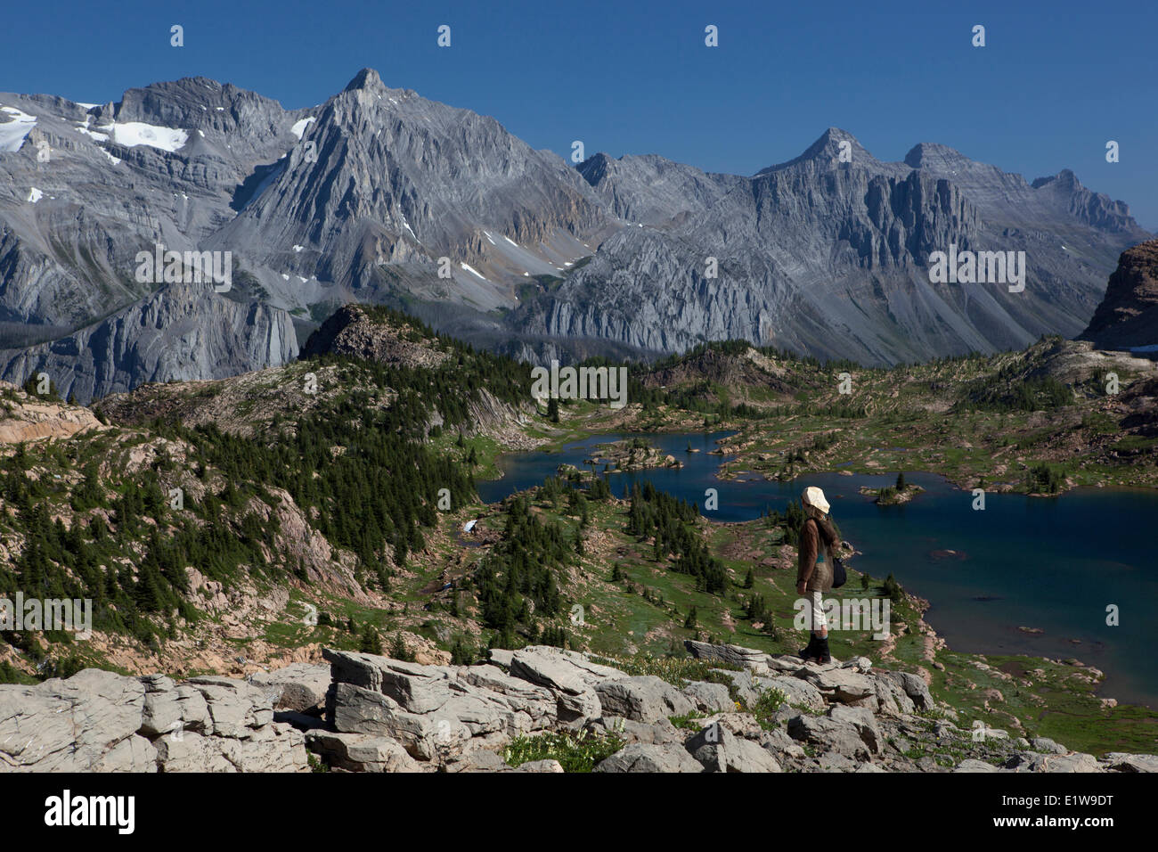 Hiker above Limestone Lakes looking at Mount Lancaster Mount Marconi ...