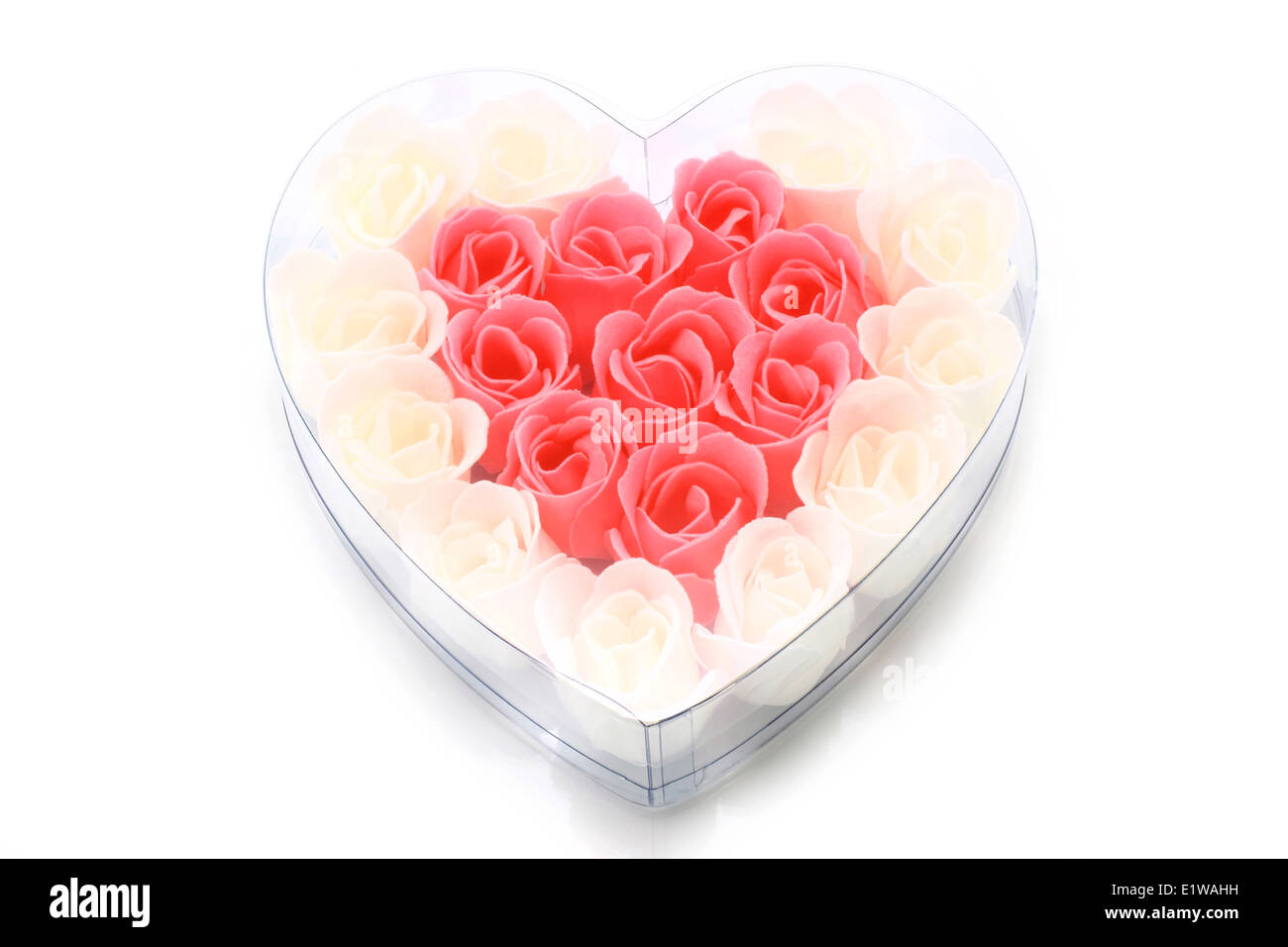 Soapy roses arranged in a heart form on a white background Stock Photo ...