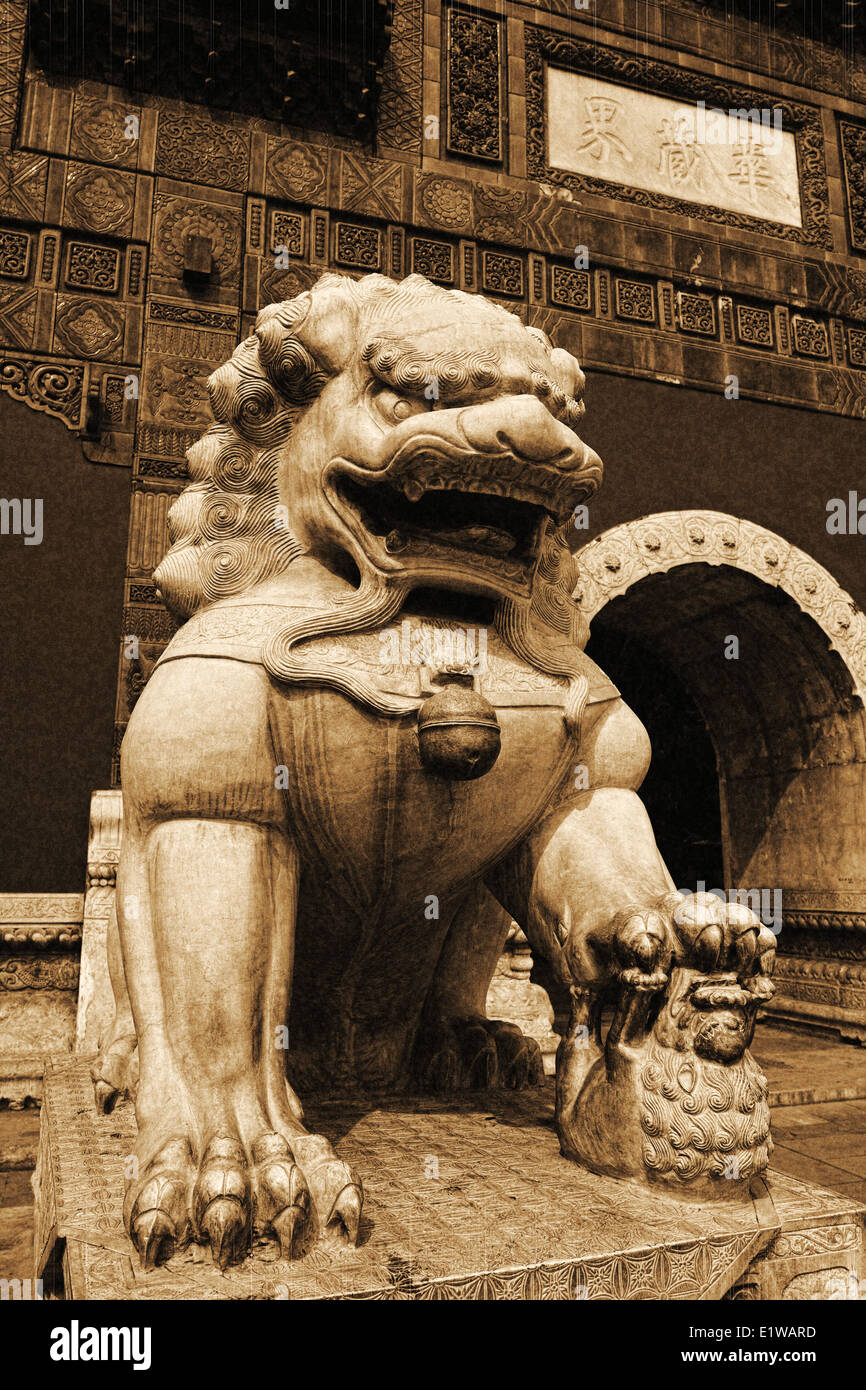 The stone lion statue in front of Chinese temple Stock Photo - Alamy