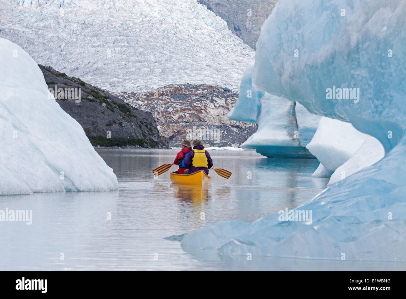 Canoeing near iceberg, Jacobson Glacier, Chilcotin Ark, Coast Mountains ...