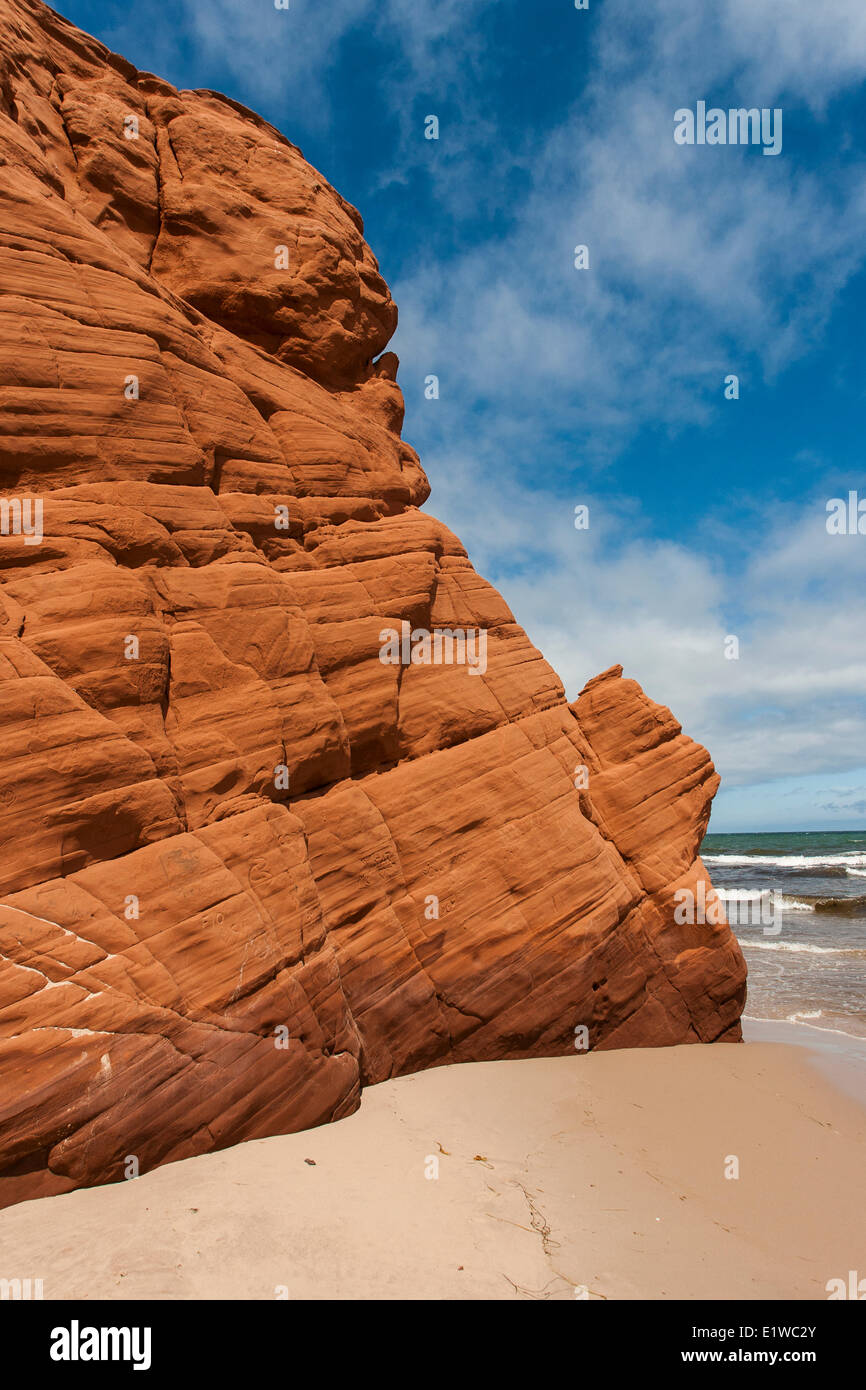 Giant red rock formations on the beaches of La Cap, Magdalen Islands ...