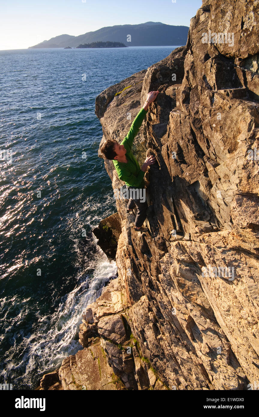 Rock climbing above the ocean at Lighthouse Park. West Vancouver ...