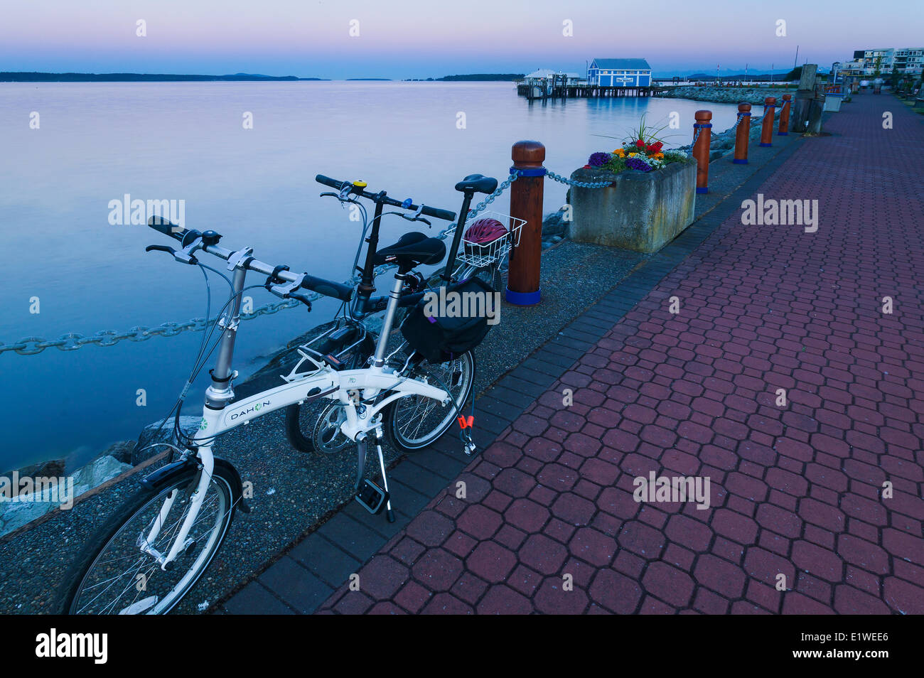 The Sidney waterfront walkway 2.5 km long reflects the subdued light ...