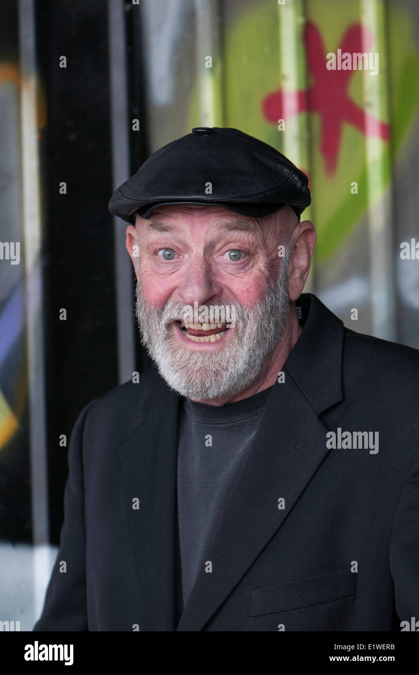 Older man with leather cap and beard Stock Photo - Alamy
