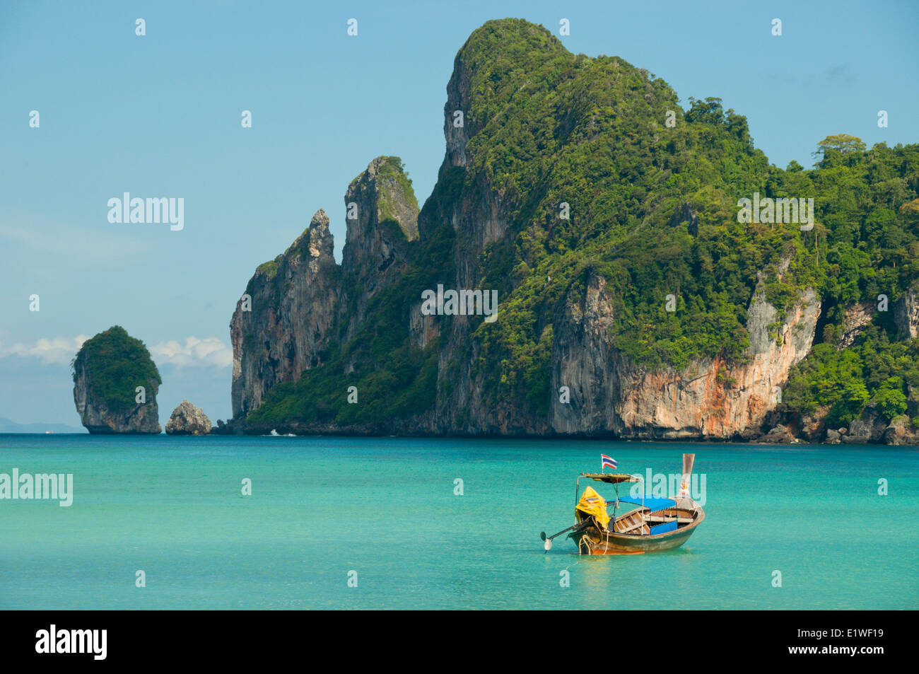 A long-tailed boat in Loh Dalam Bay, Phi Phi Islands, Thailand; site of ...