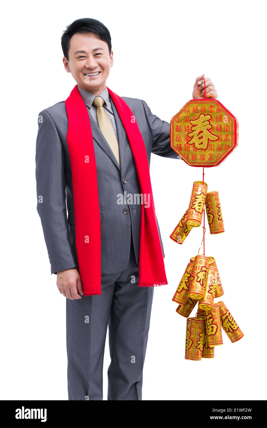 Happy businessman celebrating Chinese New Year Stock Photo - Alamy