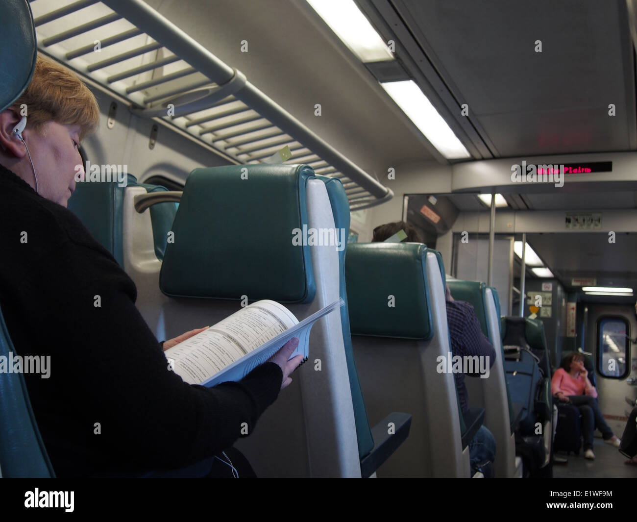 Woman reading on Metro-North commuter train in New York, USA, May 30 ...