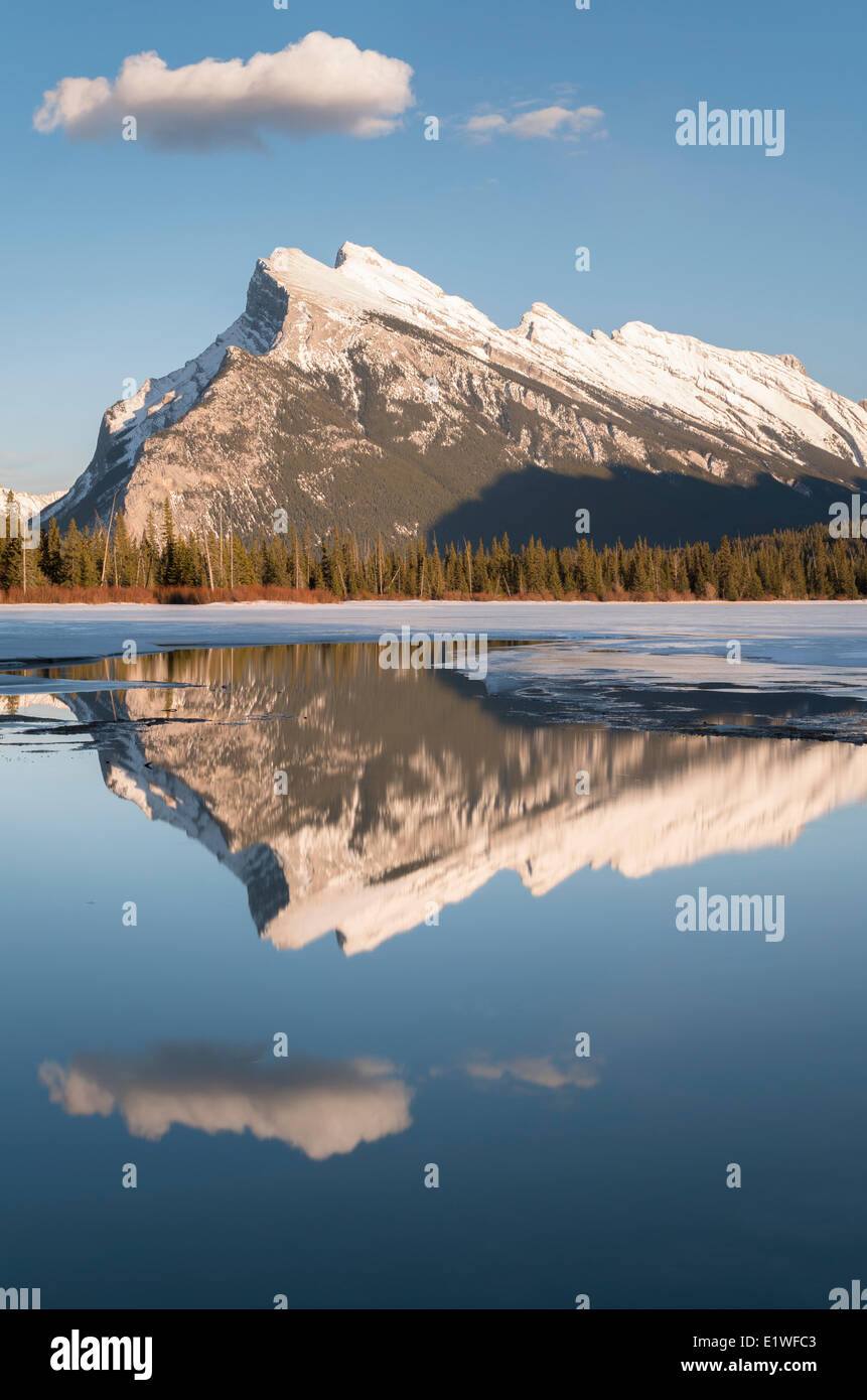 Mount Rundle reflecting on Vermilion Lakes in winter in Banff National ...
