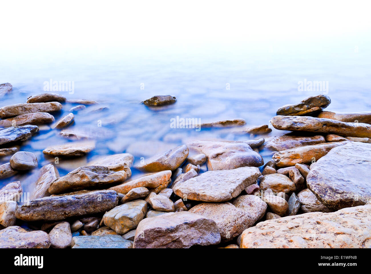 Rocks on the Shoreline Stock Photo - Alamy