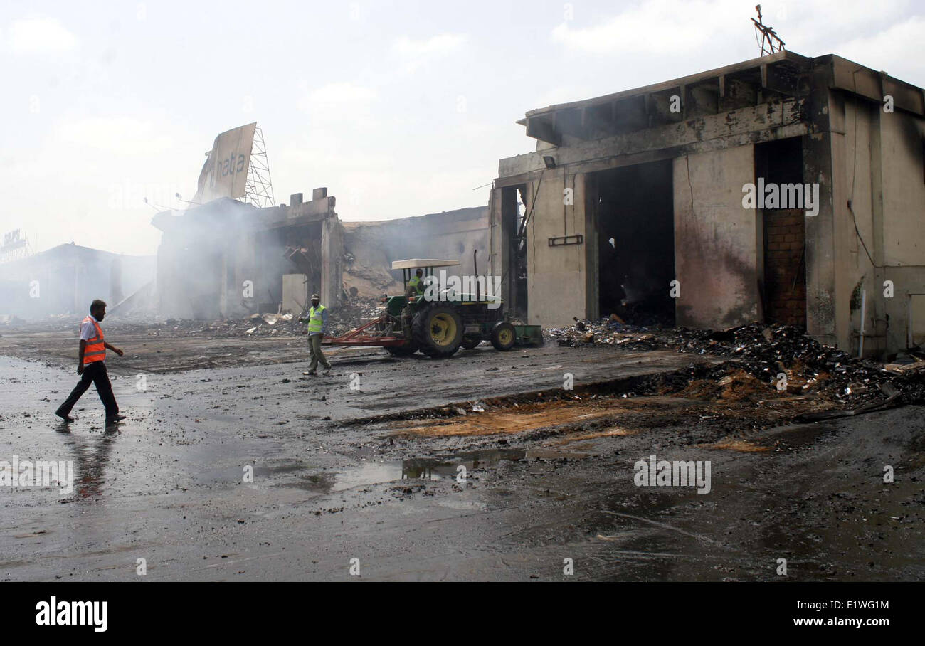 View of devastated cargo terminal burnt in suicidal blast during attack ...