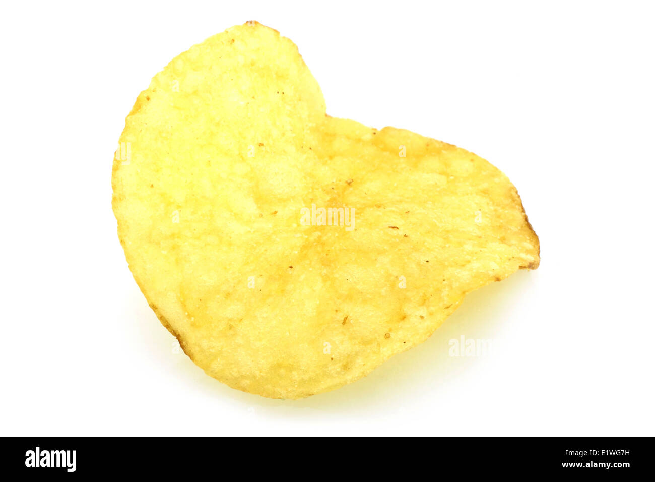 Single potato chip close-up on a white background Stock Photo - Alamy