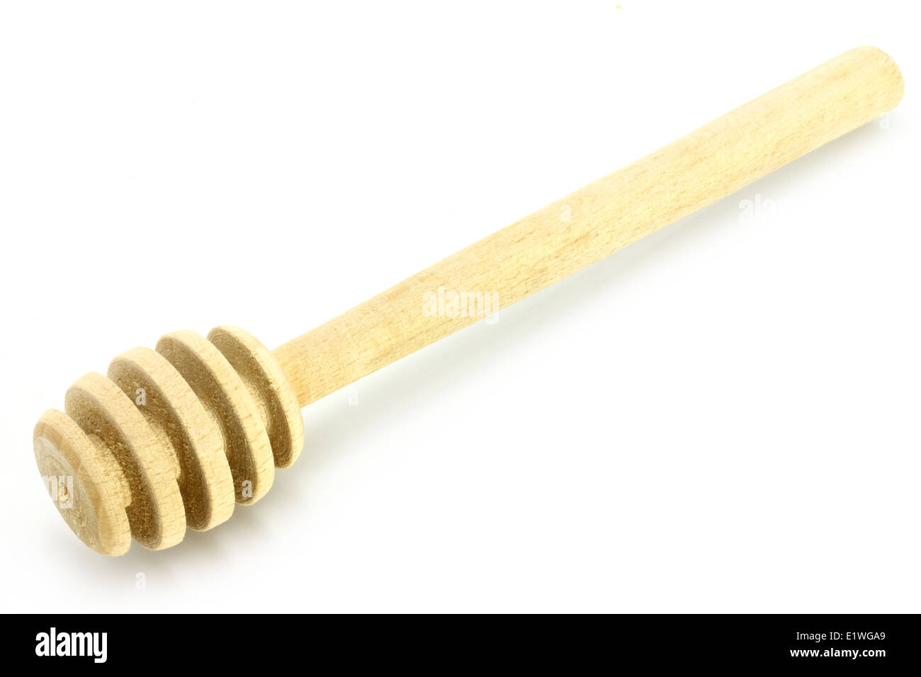 Wooden dipper on a white background Stock Photo - Alamy