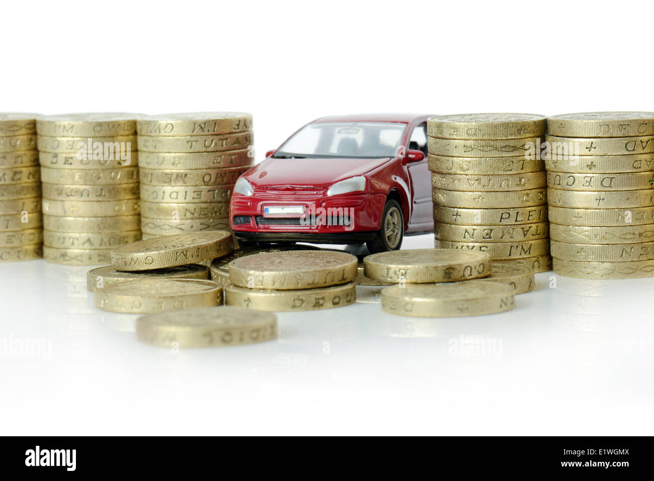 a red car breaking through a wall of money isolated on a white ...