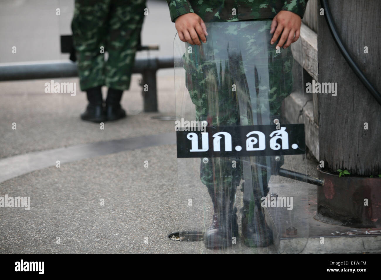 Chiang Mai, Thailand. 10th June, 2014. Soldiers stand guard at a ...