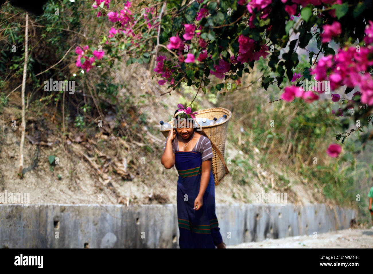 Indigenous people collect water from long distance Stock Photo - Alamy