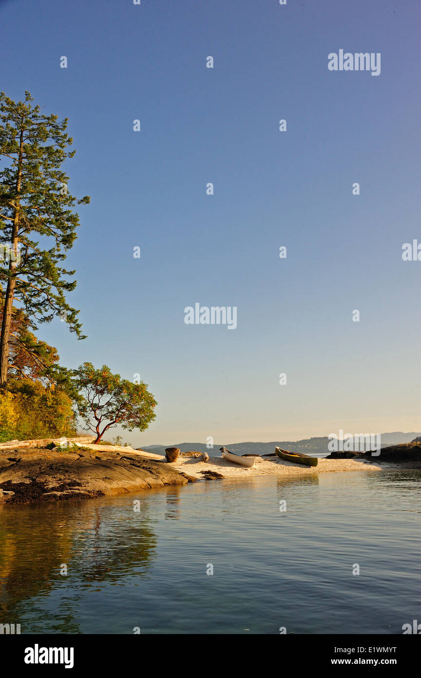 canoes on shell (midden) beach, Russell Island, Gulf Islands, British ...