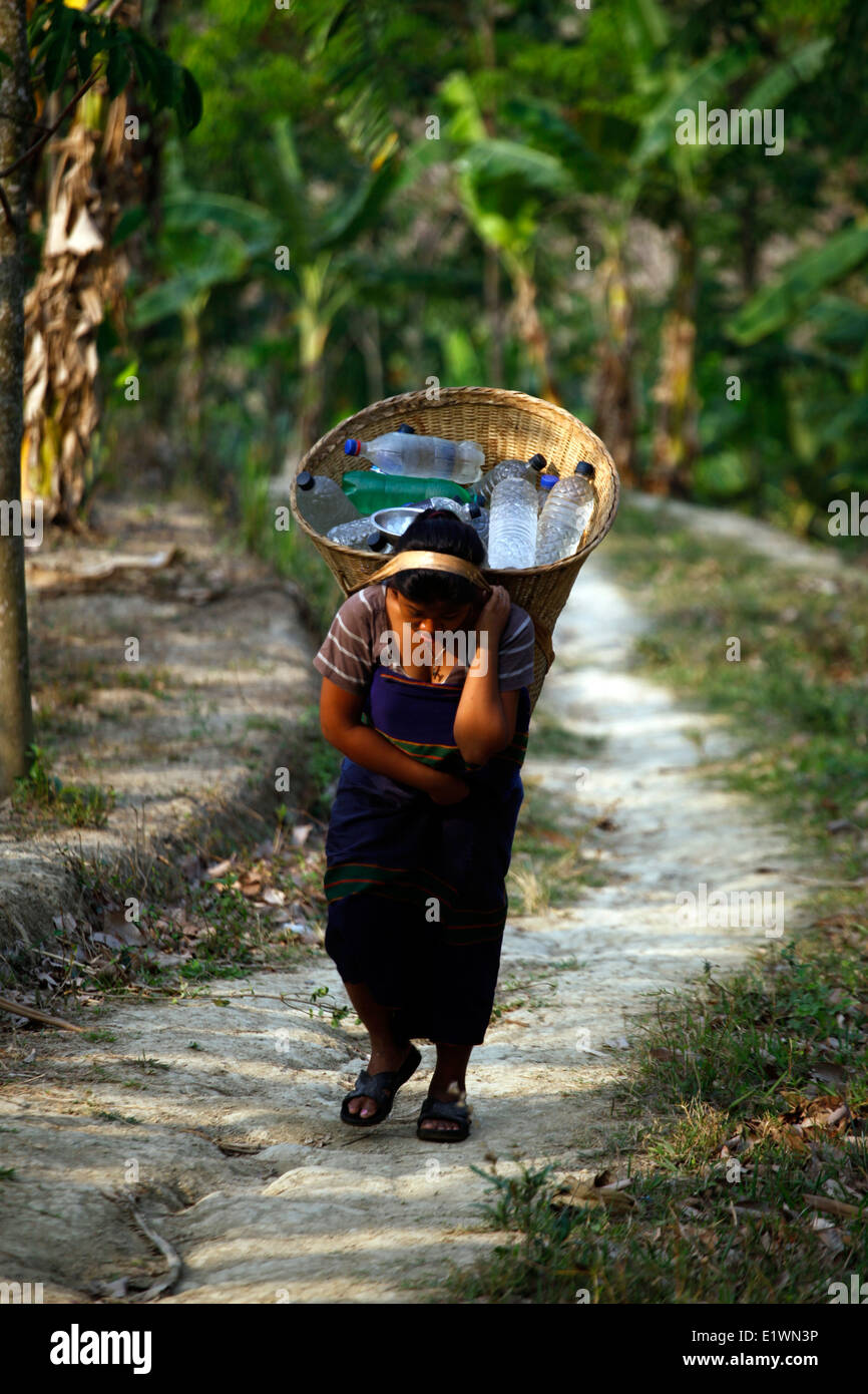 Indigenous people collect water from long distance Stock Photo - Alamy