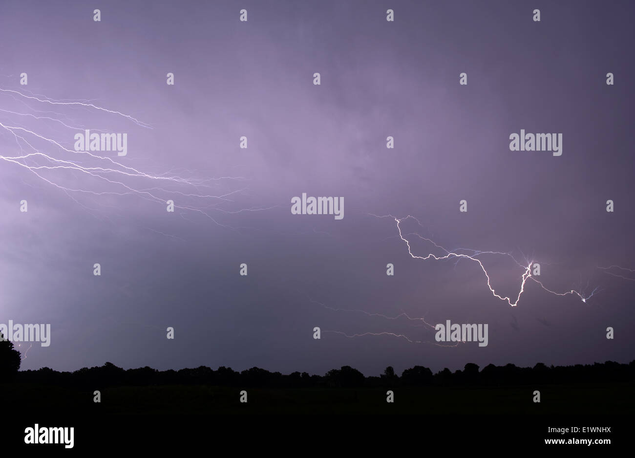 Thunder and lightning at the end of a hot and moistly summer day in the ...