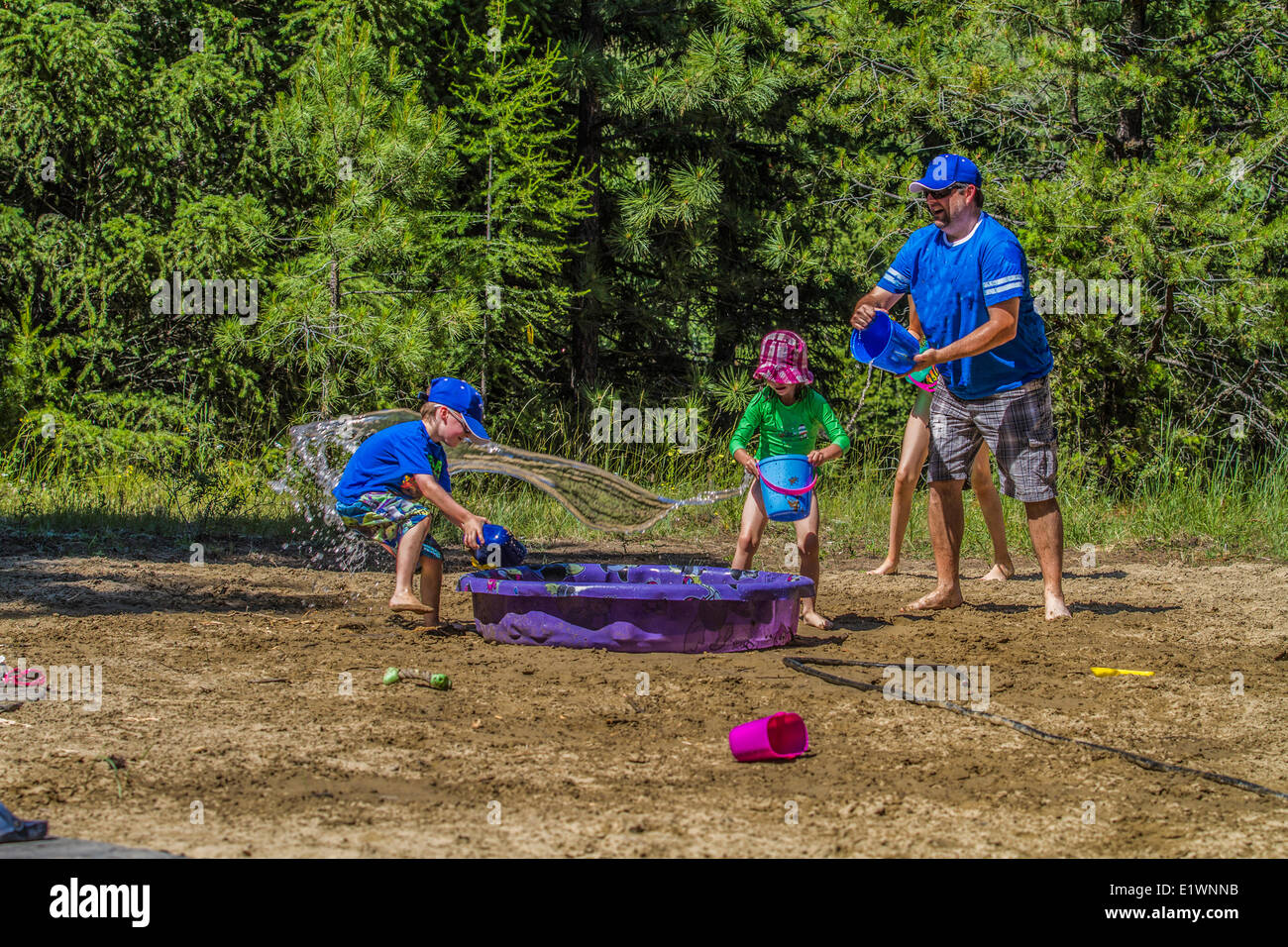 Pool water water fight hi-res stock photography and images - Alamy