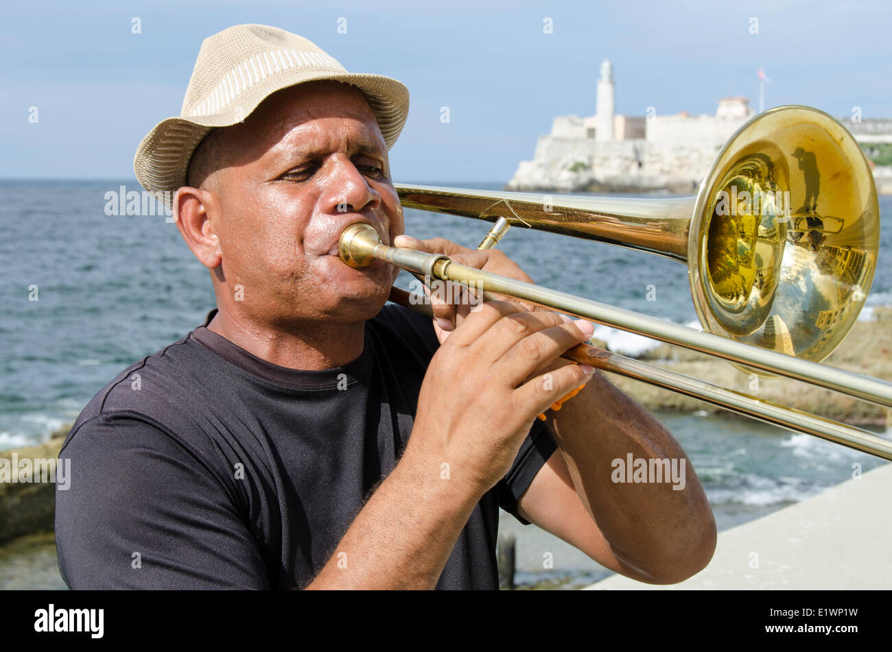 Trombone playing musicians along the malecon hi-res stock photography ...