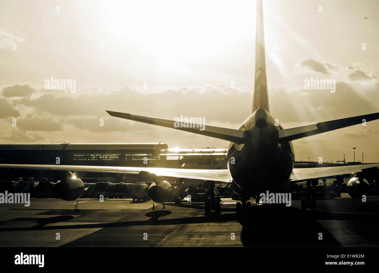 Airplane standing at an airport gate in edinburgh hi-res stock ...